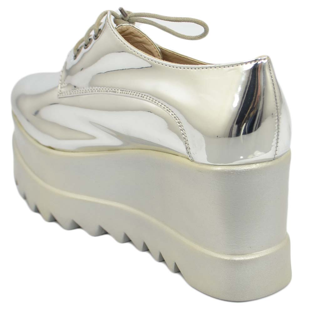 Scarpa stringata donna platform argento con para rettilinea modello ...